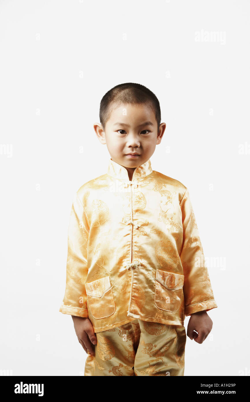 Portrait of a boy looking serious Stock Photo - Alamy