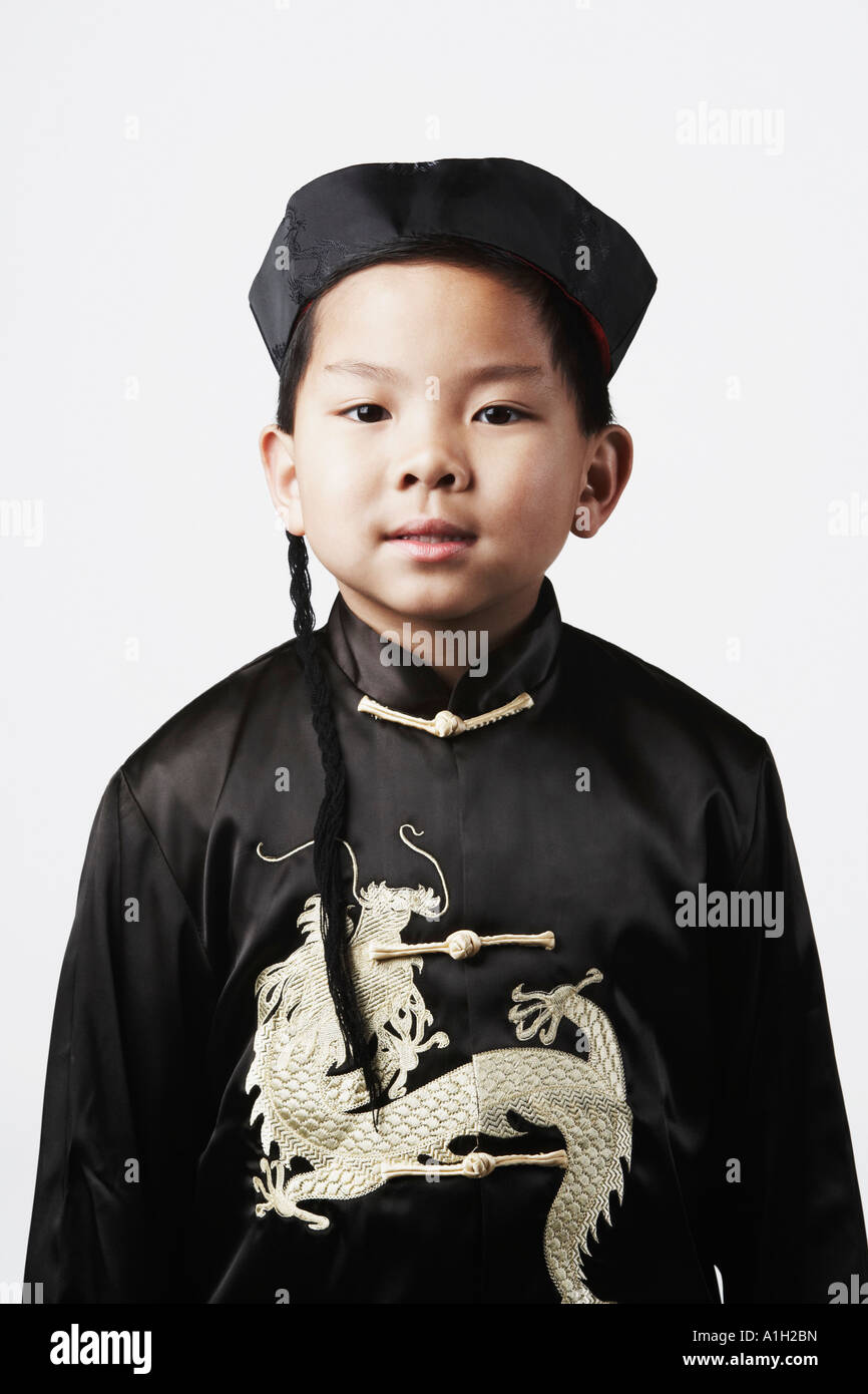 Portrait of a boy looking serious Stock Photo - Alamy
