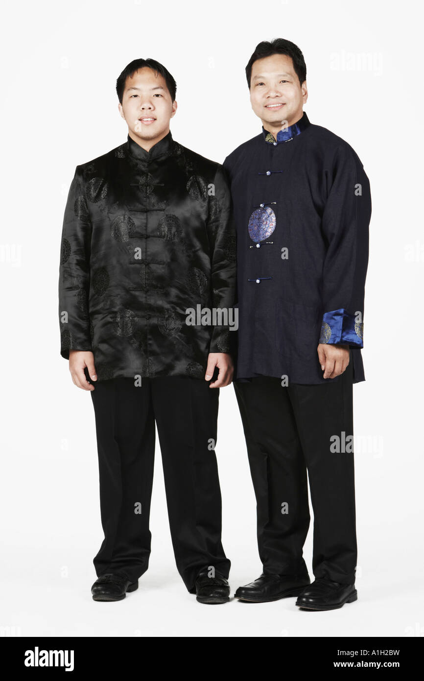Portrait of a father and his son standing Stock Photo - Alamy