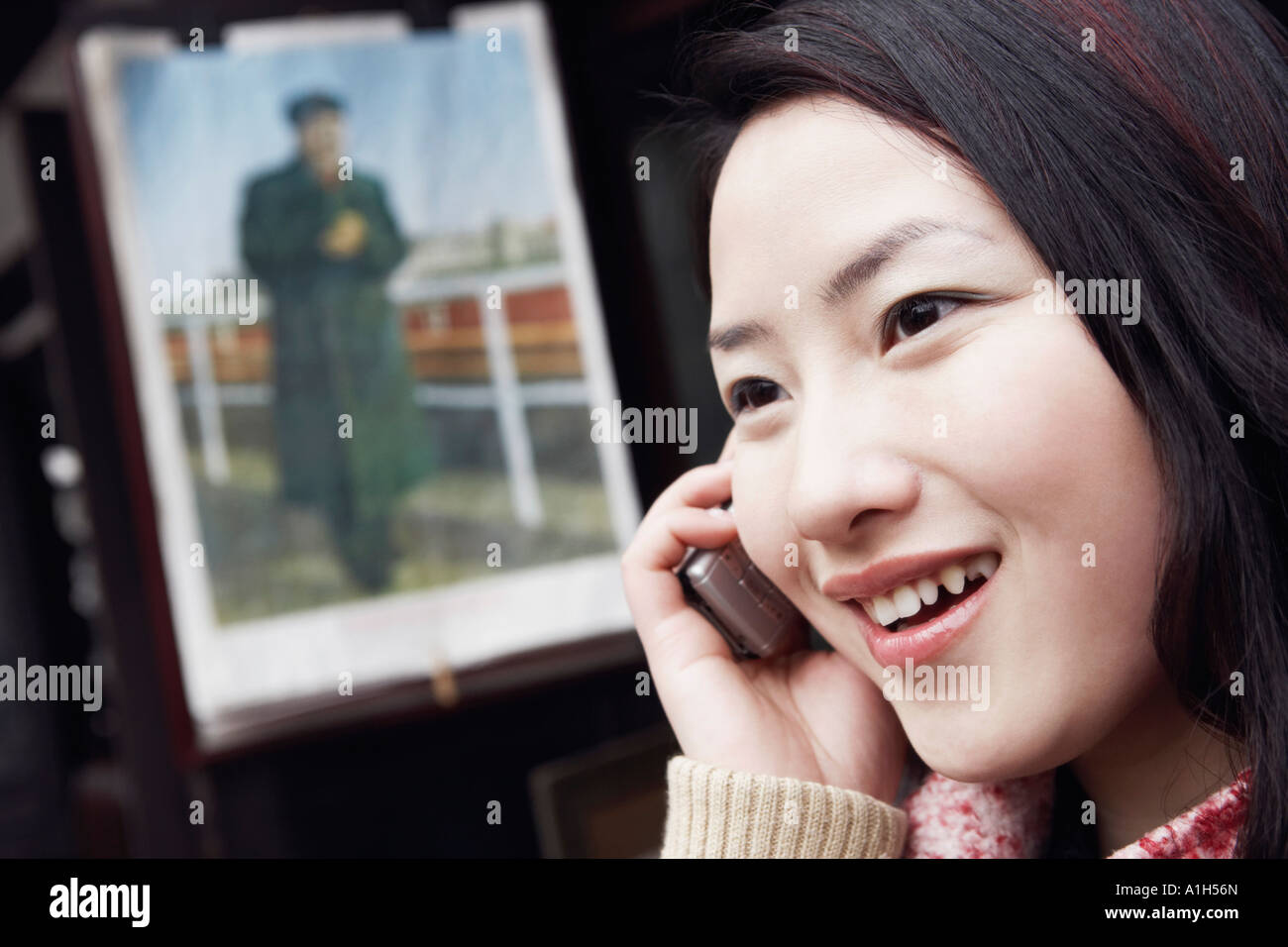 Side profile of a young woman using a mobile phone Stock Photo - Alamy