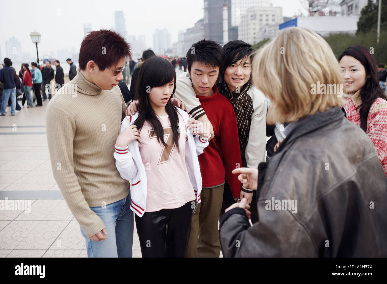 Group of people standing together Stock Photo - Alamy