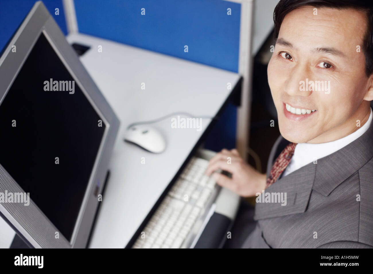 High angle view of a businessman using a computer Stock Photo - Alamy