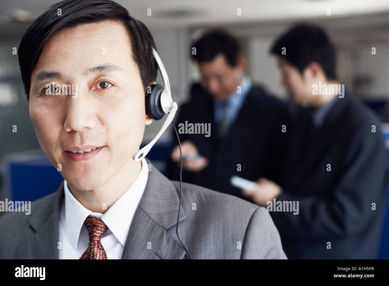 Portrait of a customer service representative wearing a headset Stock ...