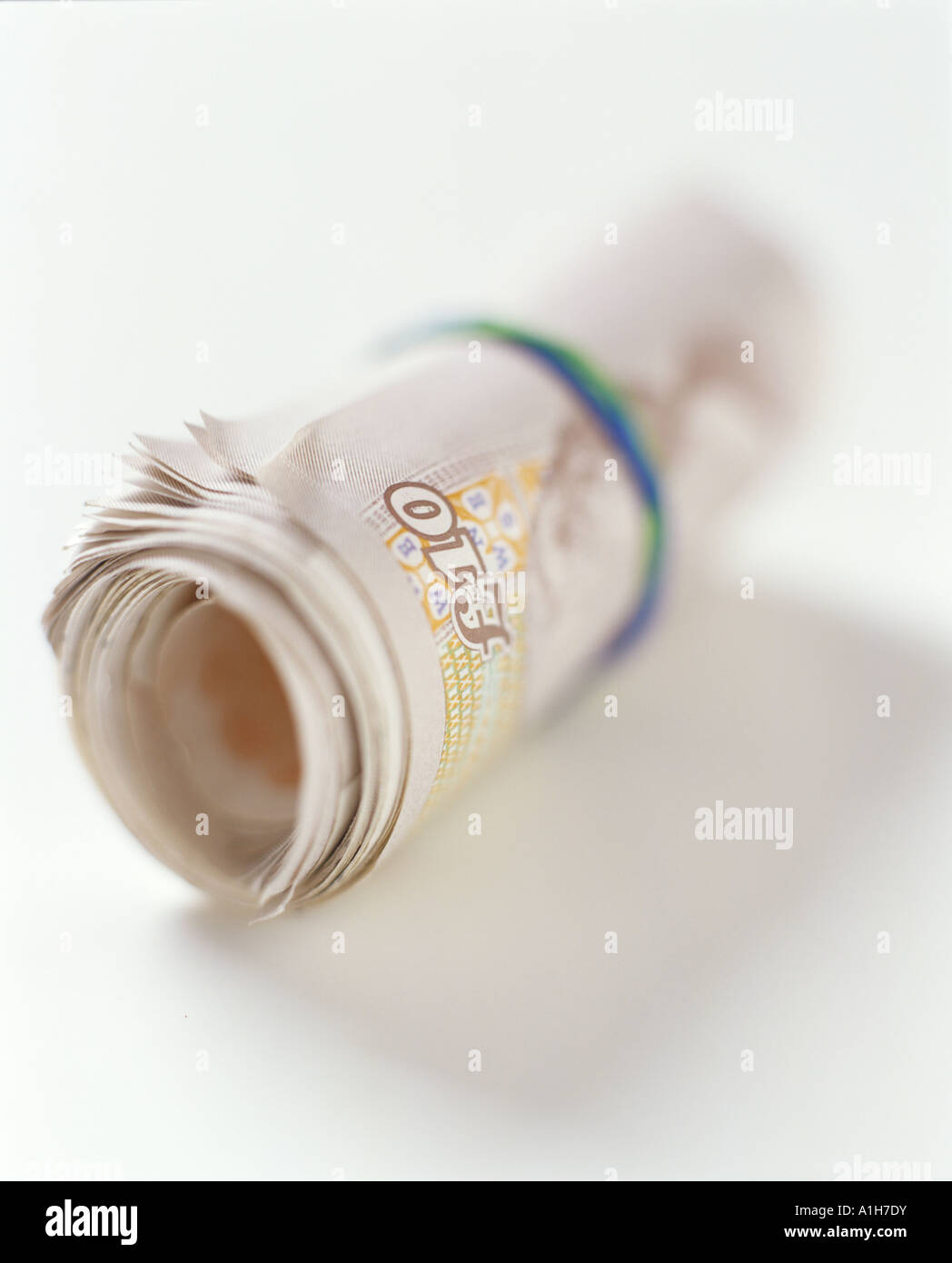 Rolled up tenner hi-res stock photography and images - Alamy