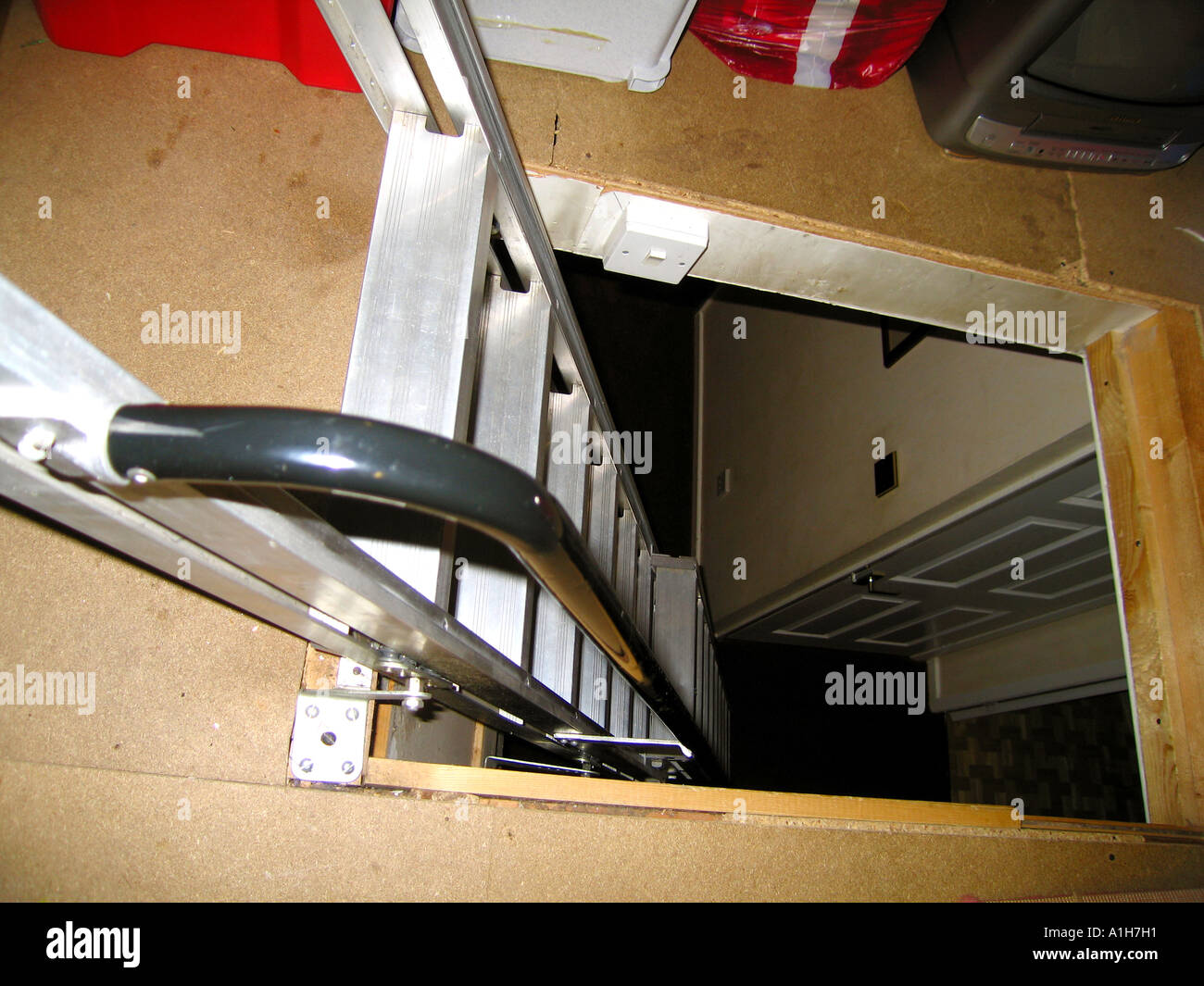 Aluminium loft ladder in hatch Stock Photo - Alamy