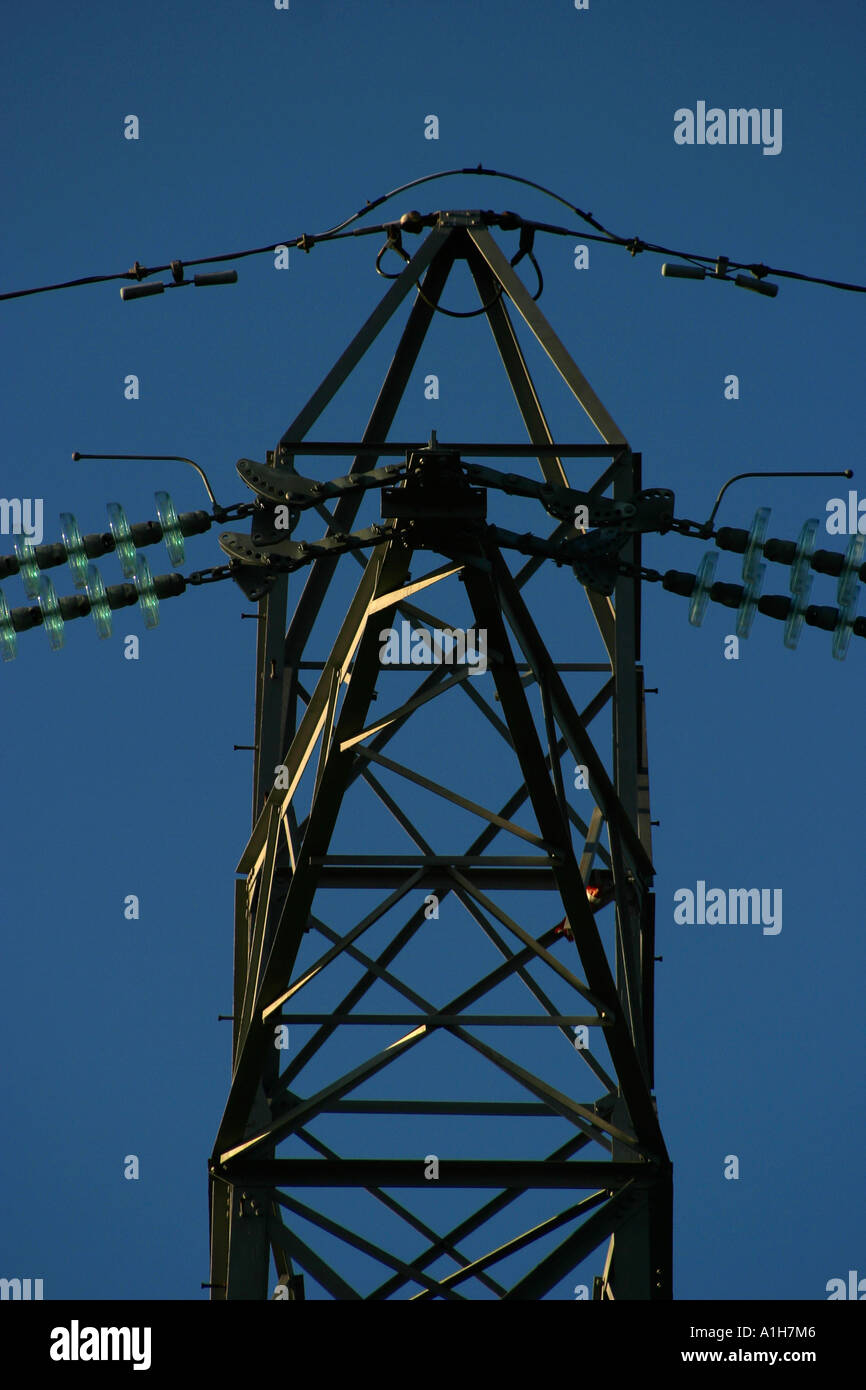 Electricity supply line pylon close crop Stock Photo - Alamy
