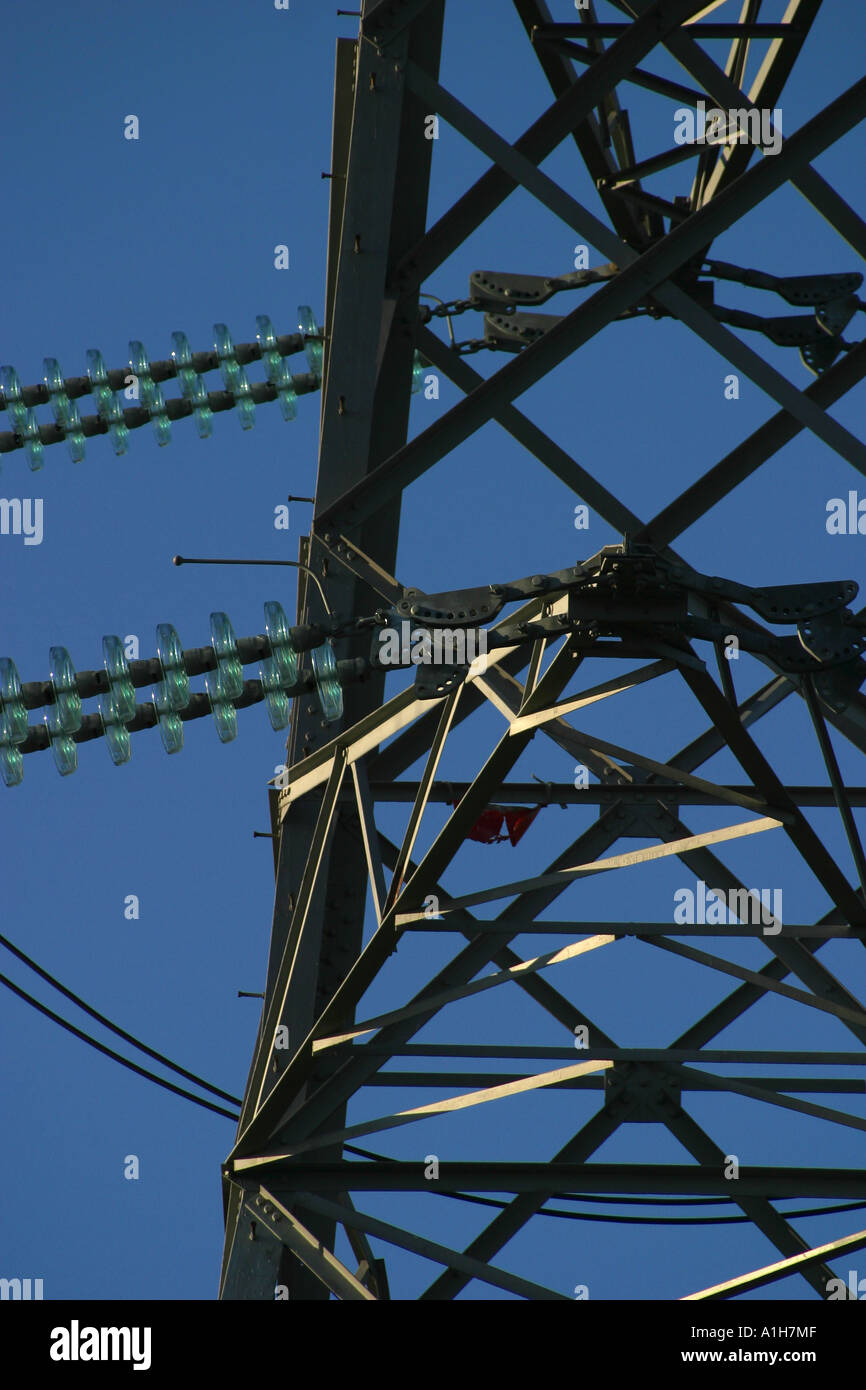 Electricity supply line pylon close crop Stock Photo - Alamy