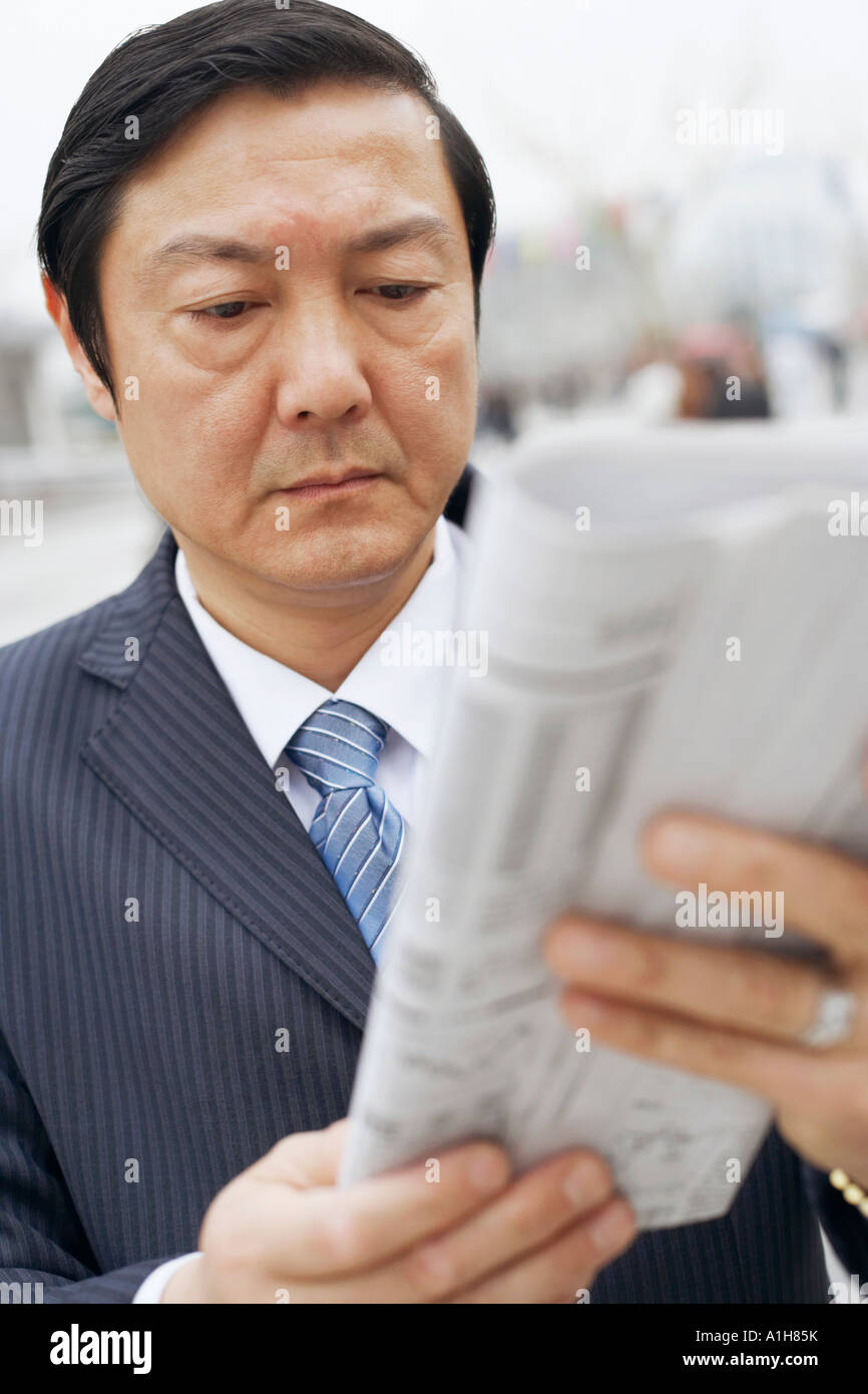 Chinese Men Reading Newspaper High Resolution Stock Photography and ...
