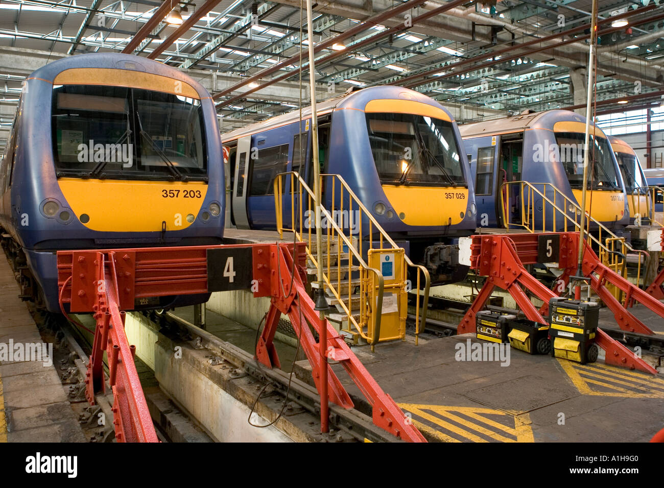 Trains in depot Stock Photo - Alamy