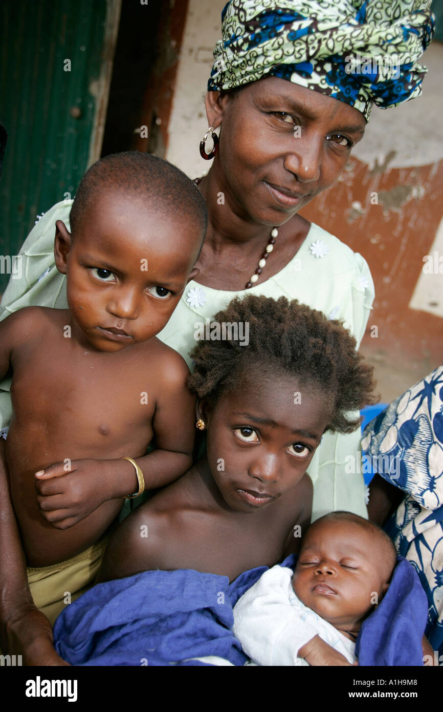 Fula woman with grandchildren Sarapati village The Gambia Stock Photo ...