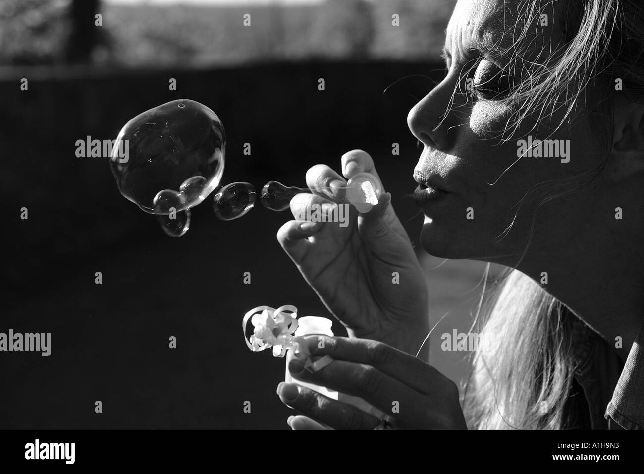 Bubbles float Black and White Stock Photos & Images - Alamy