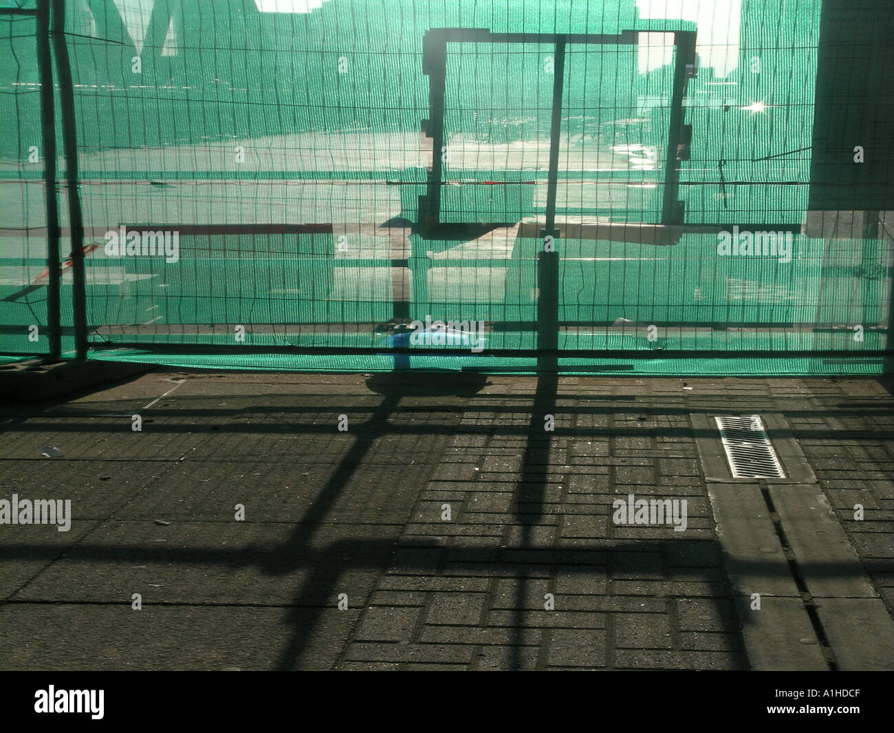 Green mesh round construction site Stock Photo - Alamy