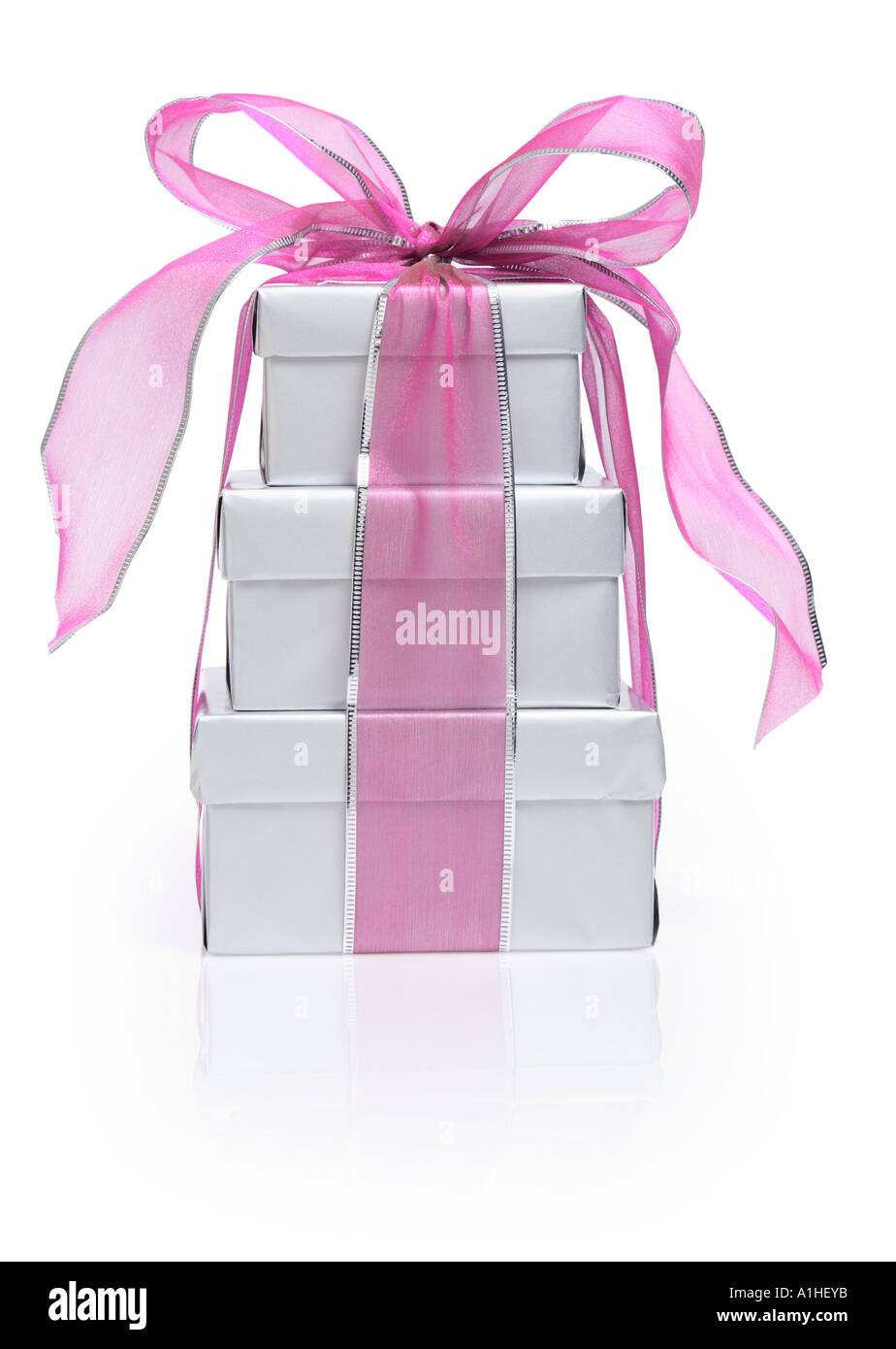 Stack of gifts with pink bow Stock Photo - Alamy