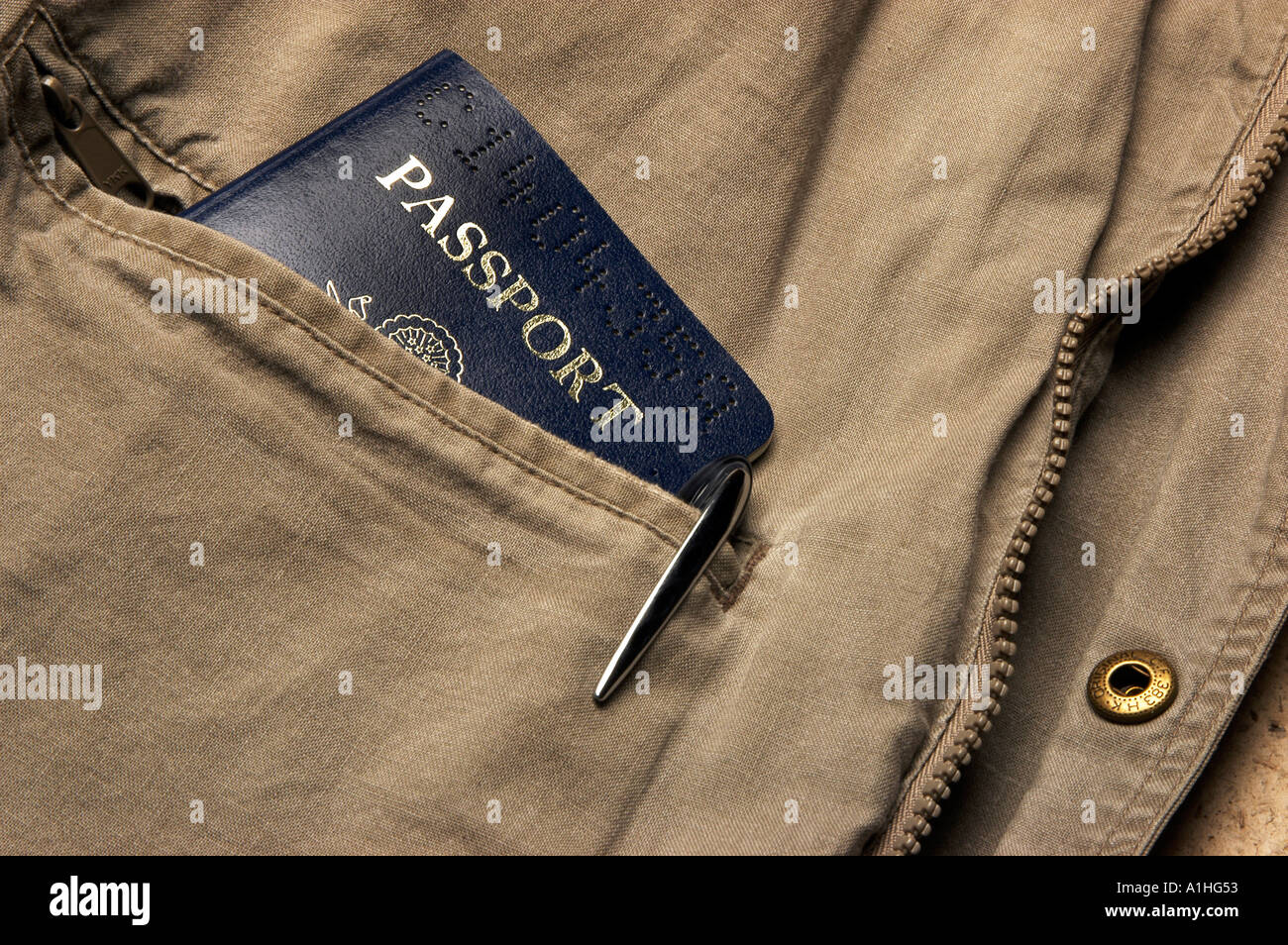 Safari jacket with passport Stock Photo - Alamy