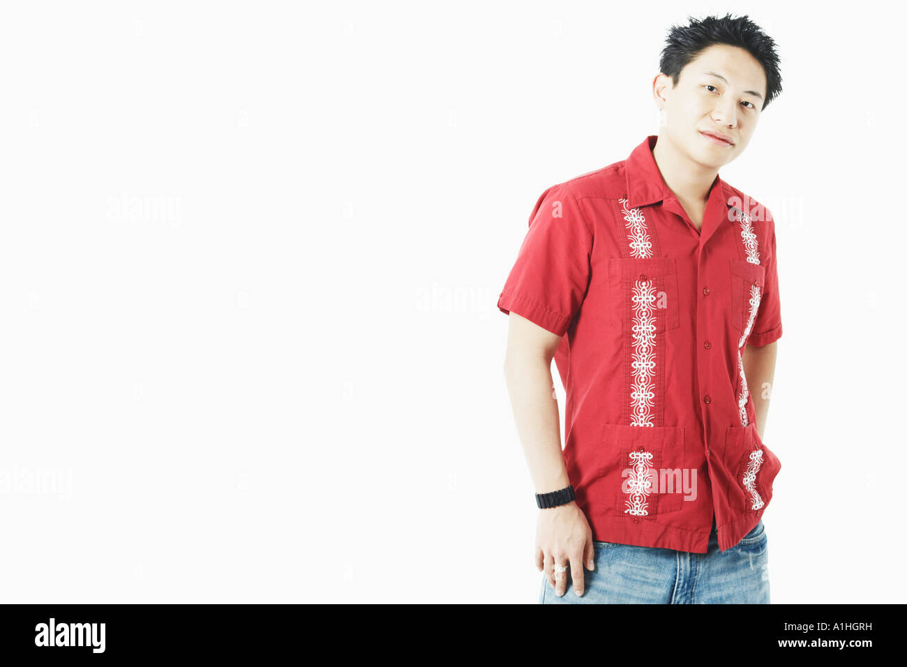 Portrait of a young man standing Stock Photo - Alamy