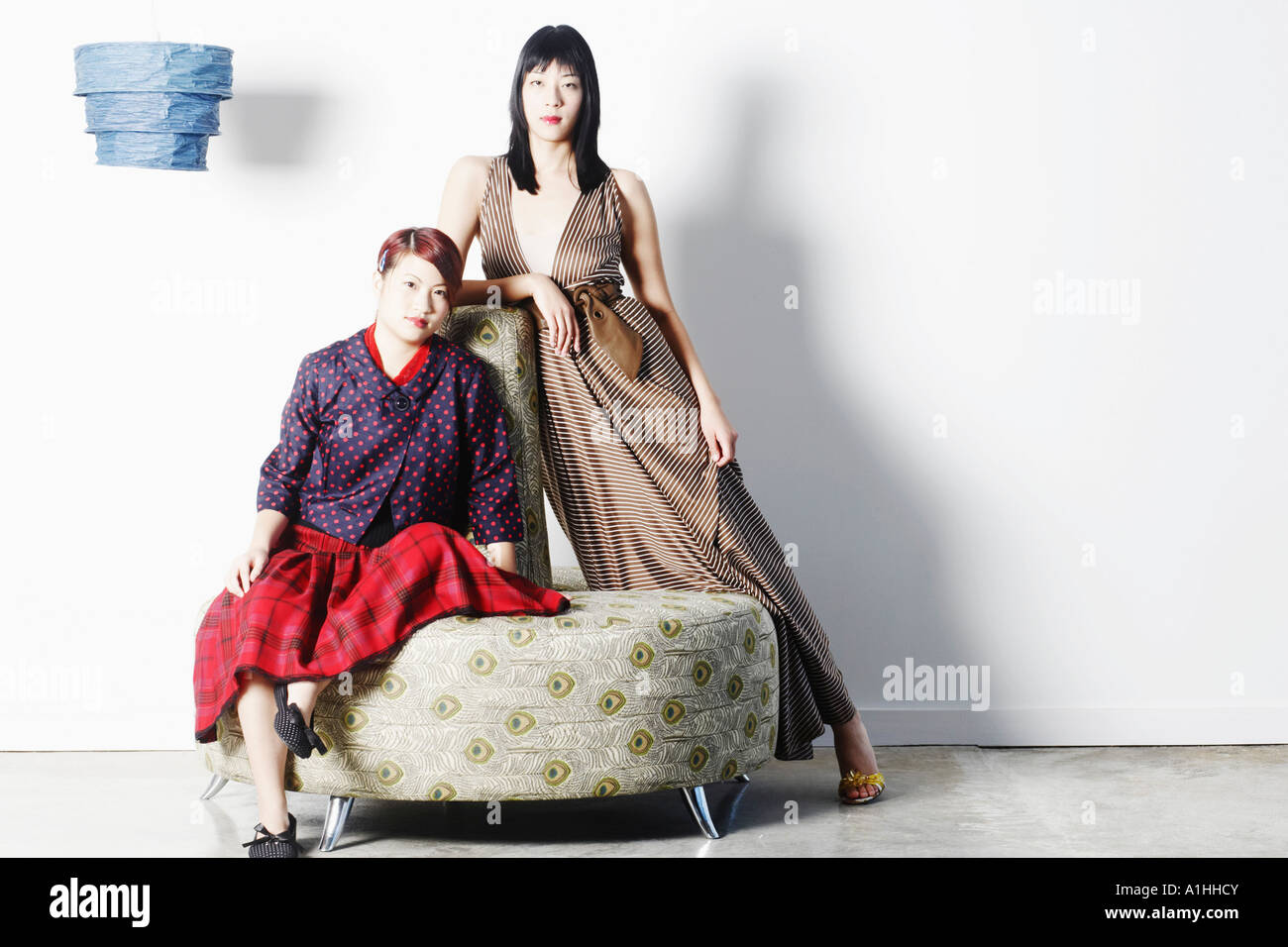 Two women females sitting hi-res stock photography and images - Alamy