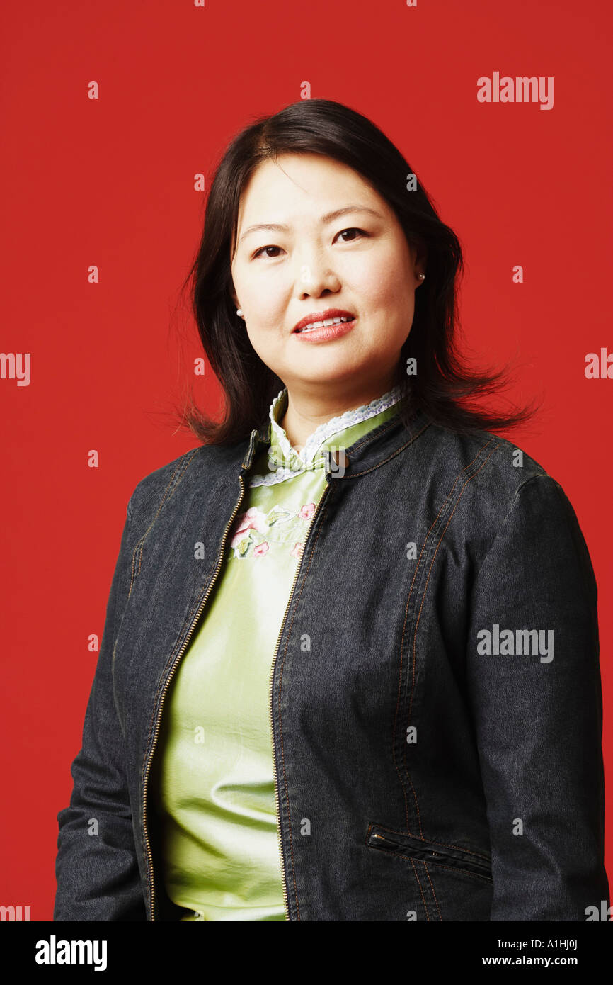 Portrait of a mid adult woman grinning Stock Photo - Alamy