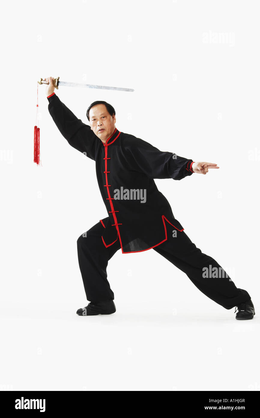 Samurai with raised sword hi-res stock photography and images - Alamy