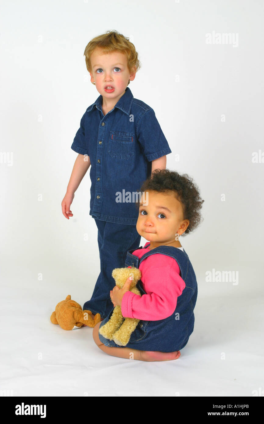 A little boy and girl looking guilty with their teddy bears Stock Photo ...