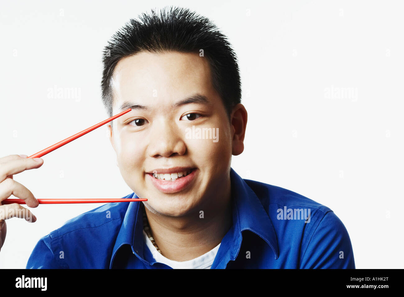 Males chopsticks hi-res stock photography and images - Alamy