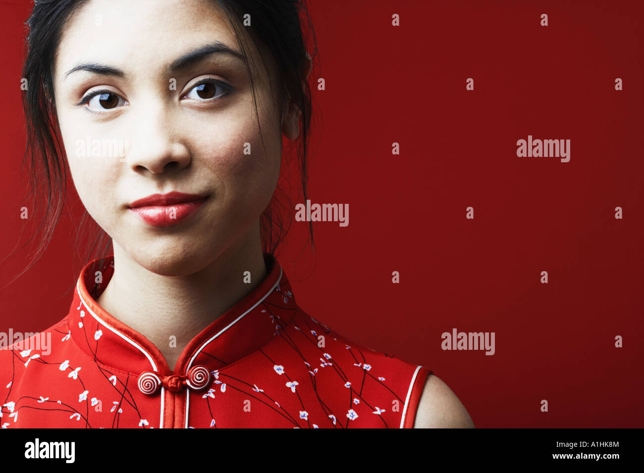 Portrait of a young woman grinning Stock Photo - Alamy