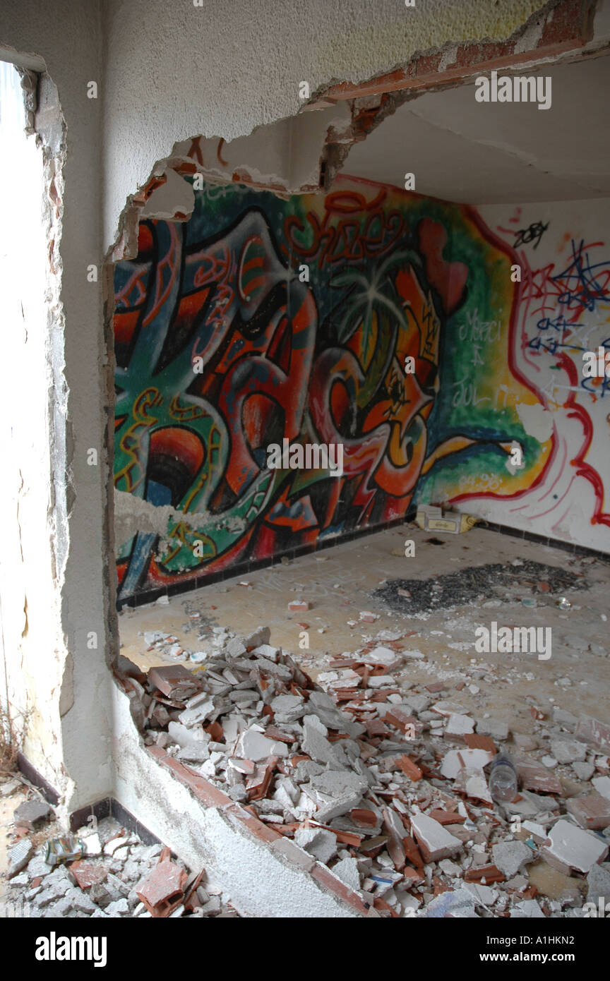 smashed wall on abandoned military base Stock Photo - Alamy