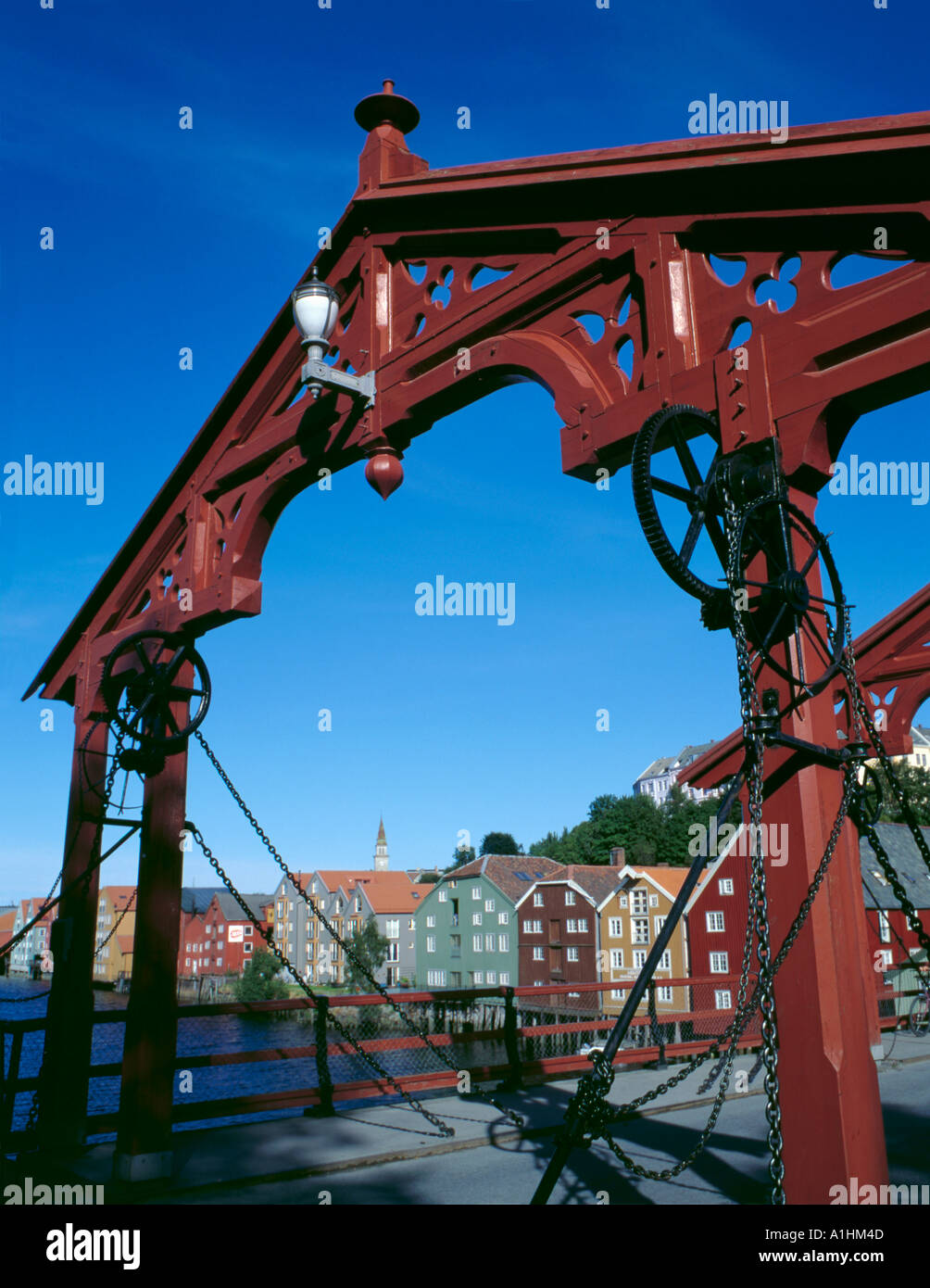 Picturesque old timber warehouses seen through Gamle Bybrua (Old Town ...