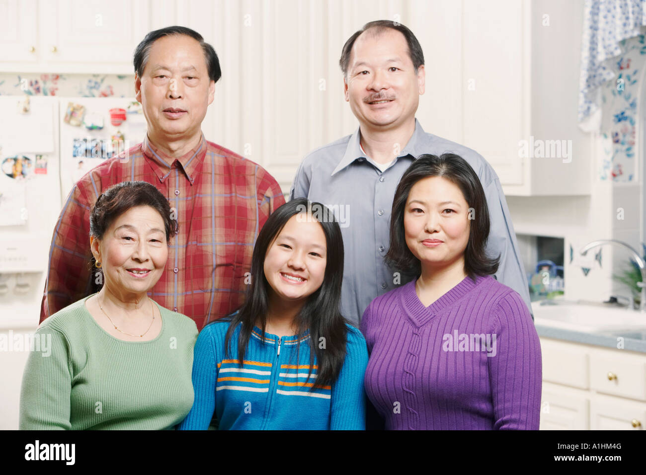 Portrait of five people smiling Stock Photo - Alamy