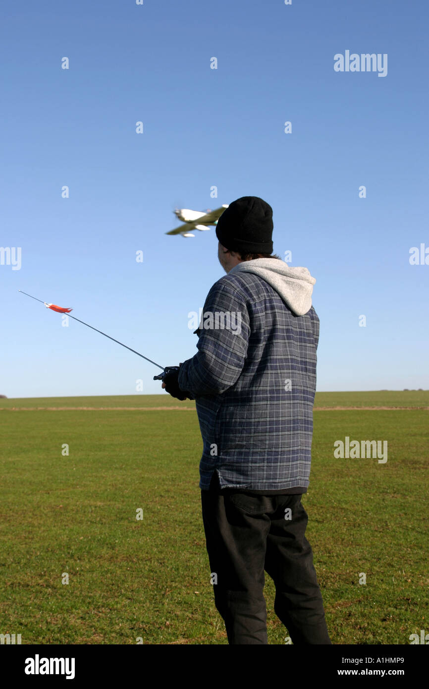 Man flying a radio controlled model aircraft Stock Photo - Alamy