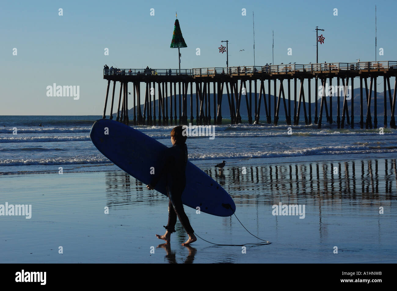 Pismo beach pier surfer hi-res stock photography and images - Alamy