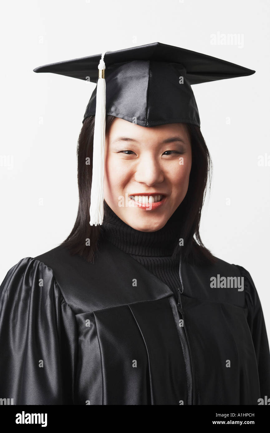 Portrait of a female graduate smiling Stock Photo - Alamy