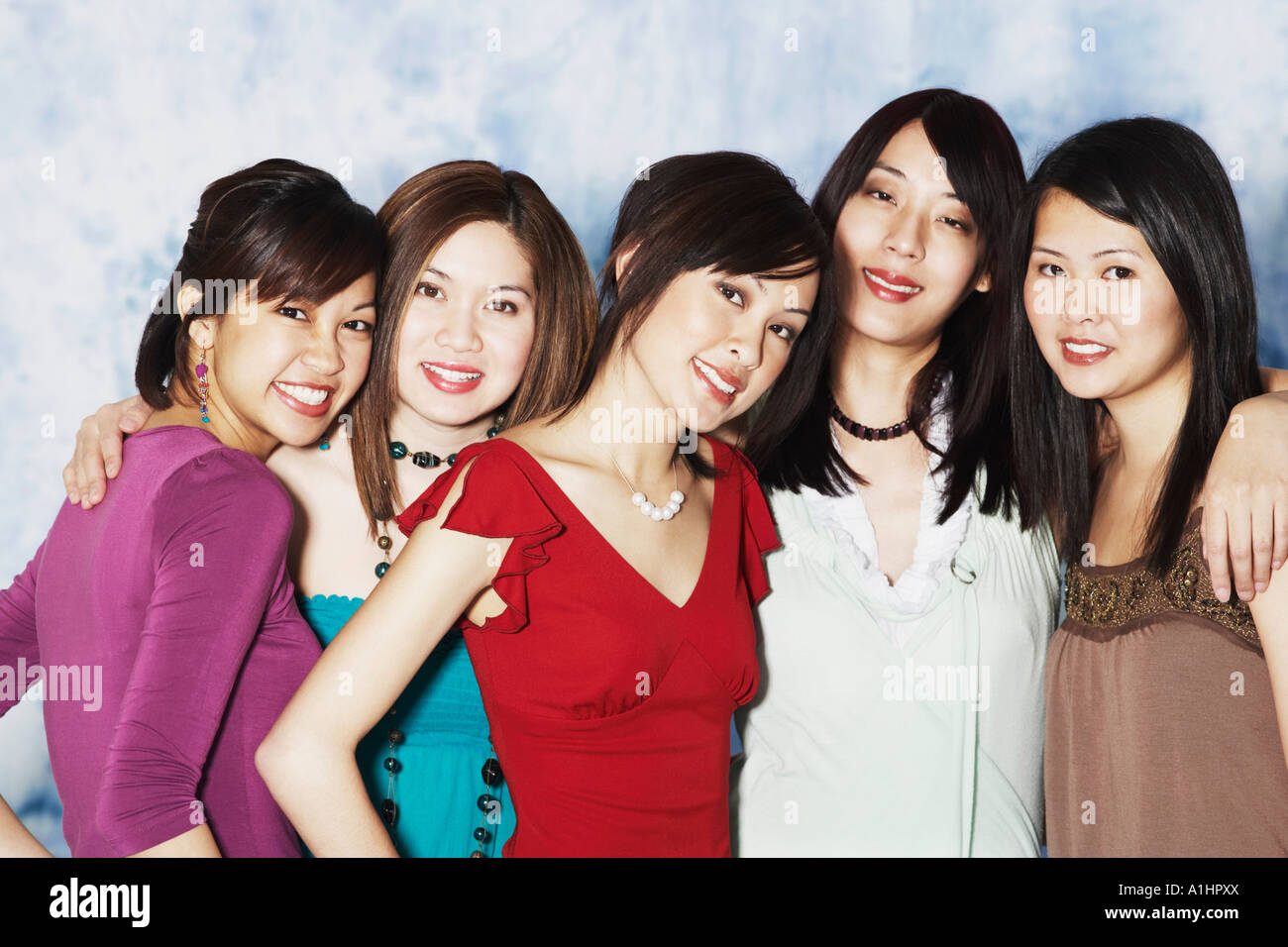 Portrait of five young women smiling Stock Photo - Alamy