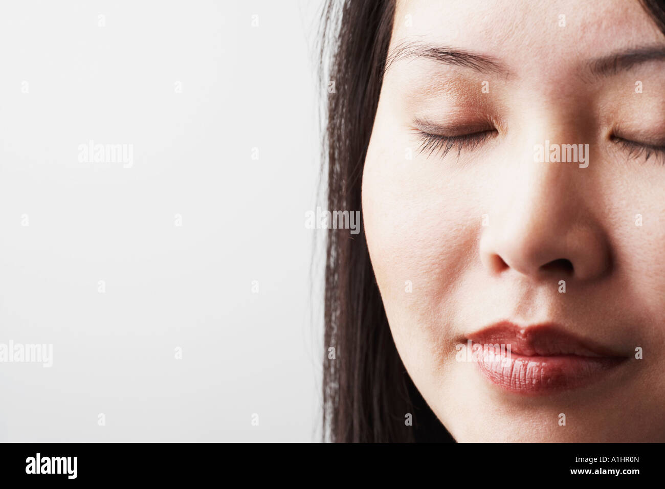 Meditating woman front face hi-res stock photography and images - Alamy