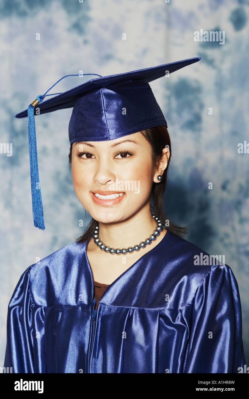 Portrait of a female graduate smiling Stock Photo - Alamy