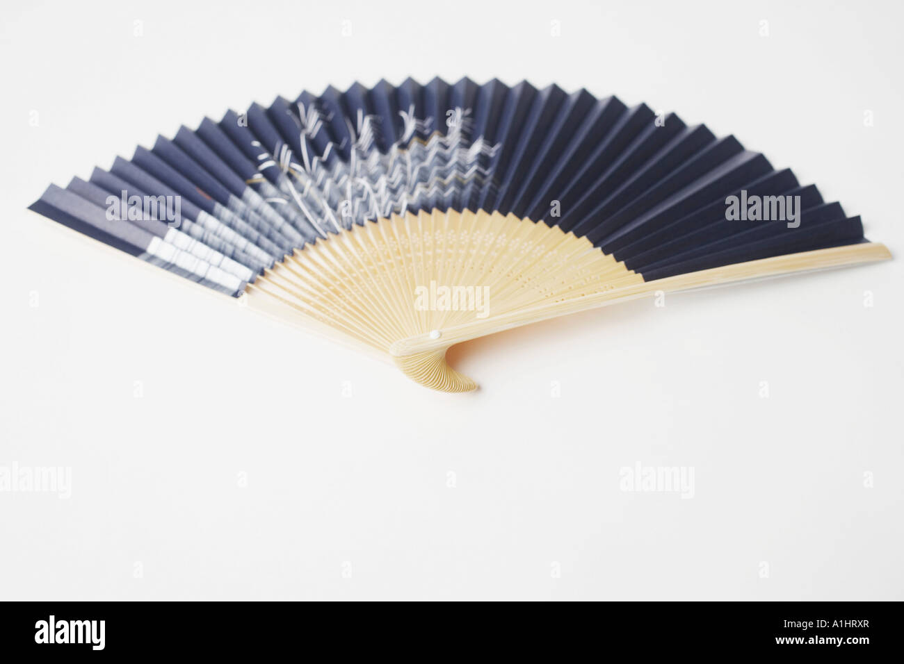 Close-up of a folding fan Stock Photo - Alamy
