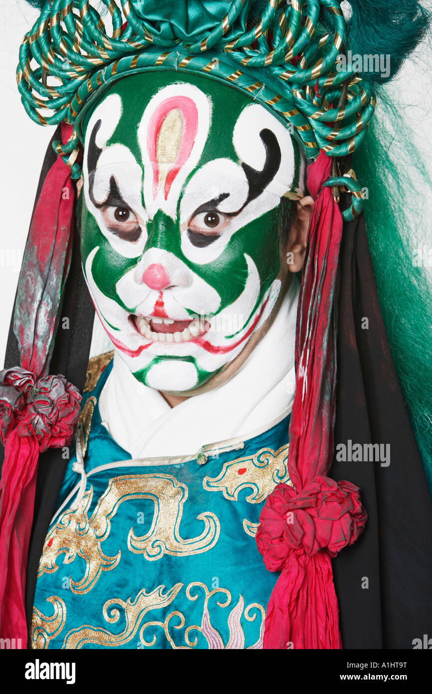 Portrait of a male Chinese opera performer grimacing Stock Photo - Alamy