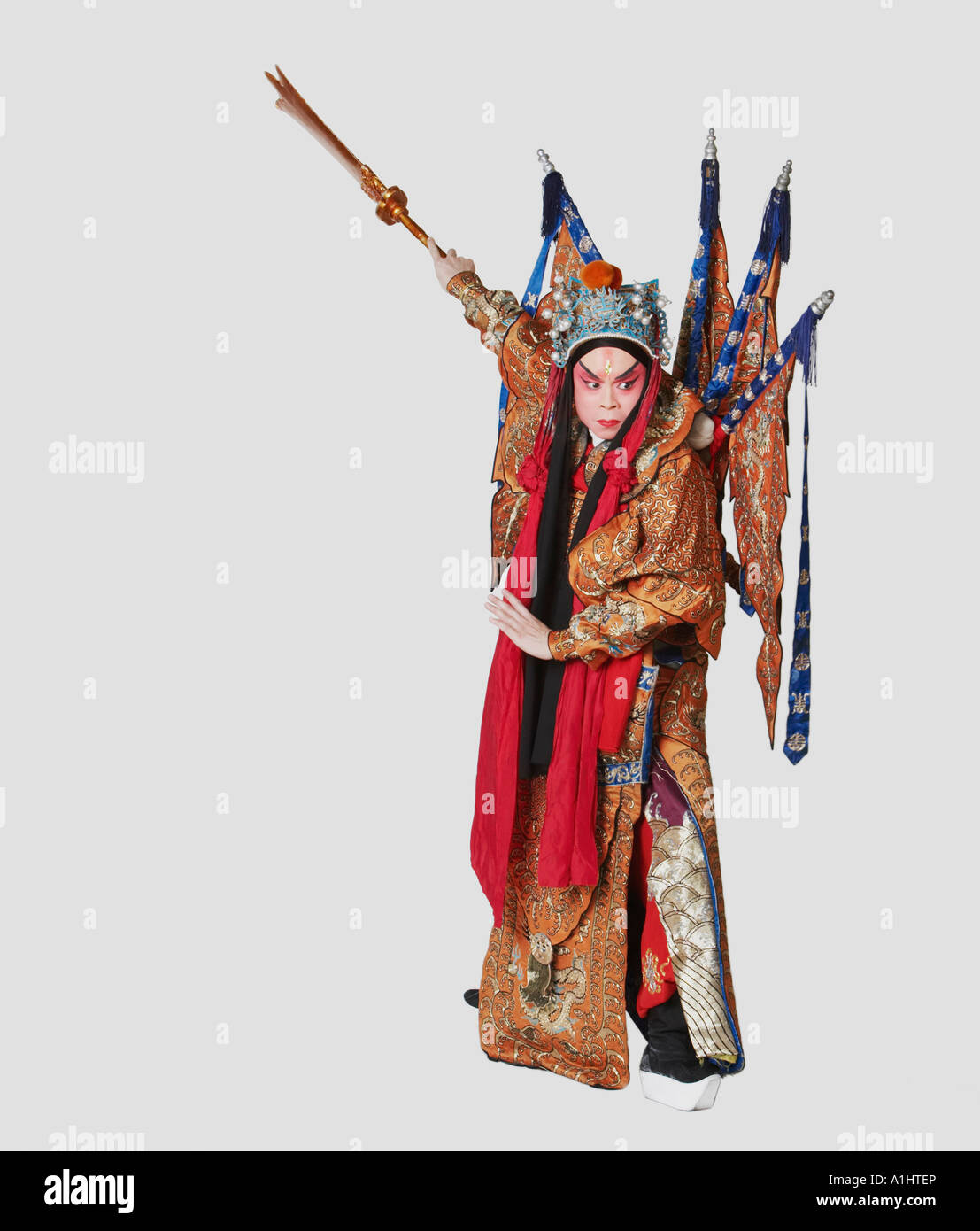 Male Chinese opera performer gesturing with a weapon Stock Photo - Alamy