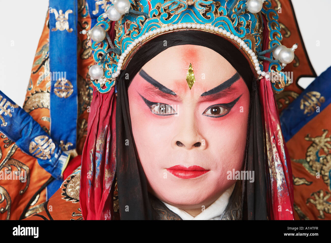 Portrait of a male Chinese opera performer looking serious Stock Photo ...