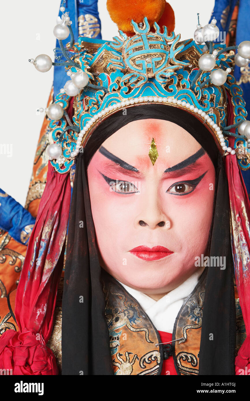 Portrait of a male Chinese opera performer looking serious Stock Photo ...