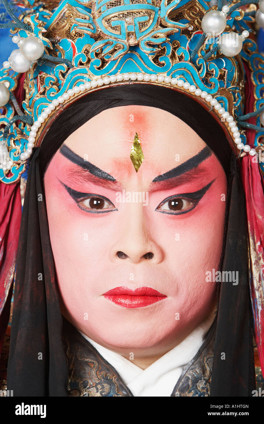 Portrait of a male Chinese opera performer looking serious Stock Photo ...