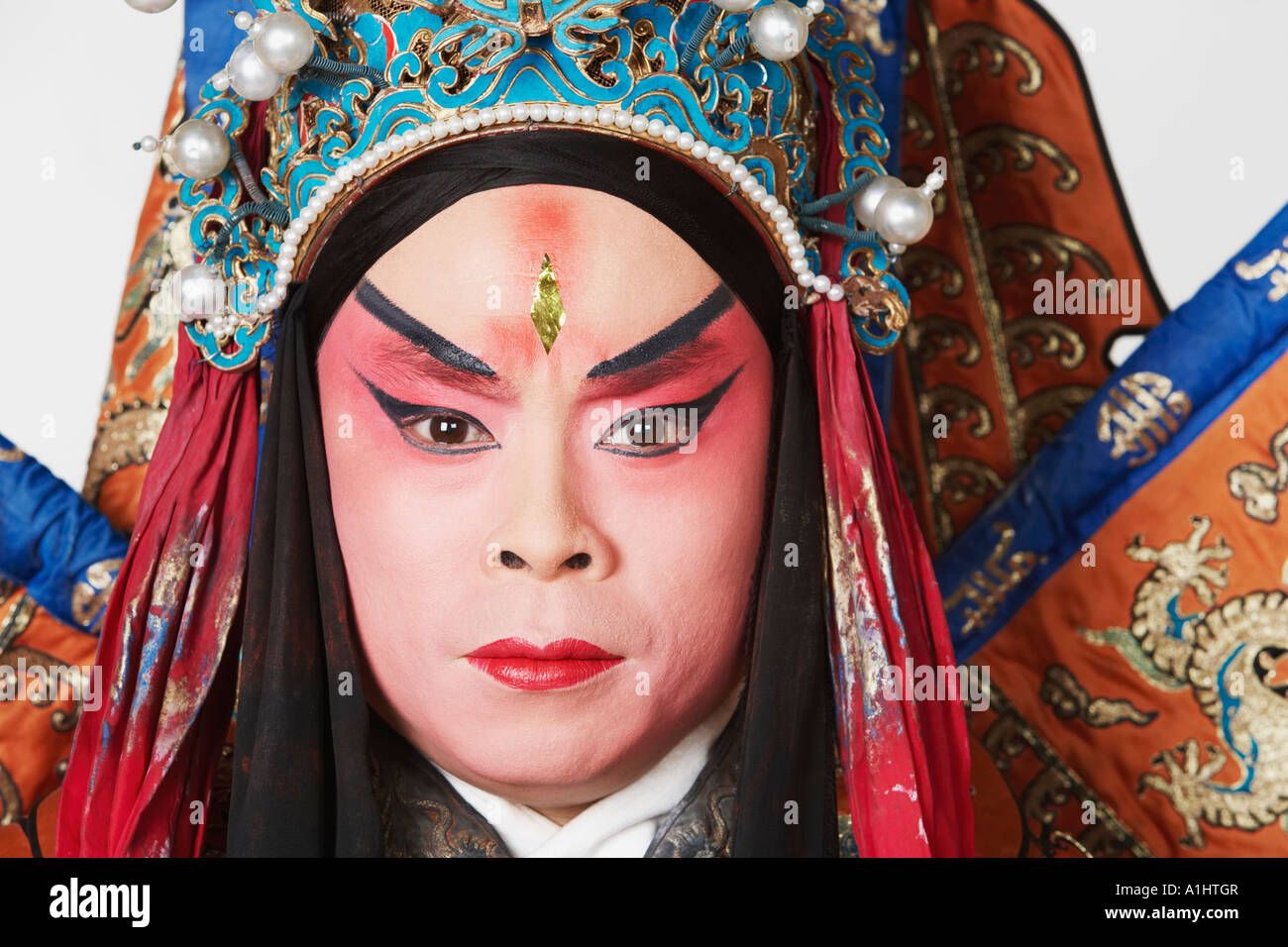 Portrait of a male Chinese opera performer looking serious Stock Photo ...