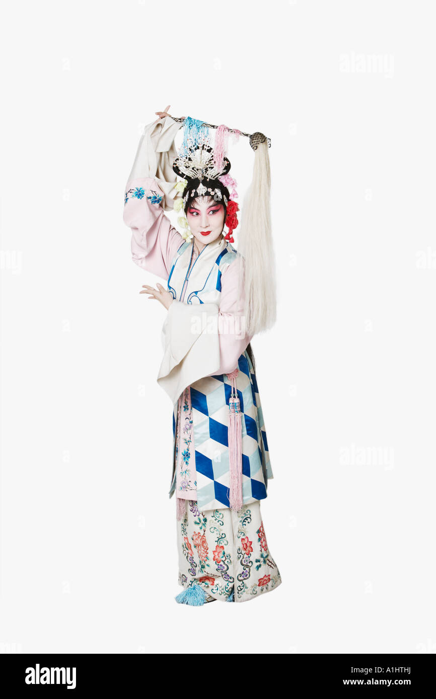 Traditional woman standing wearing Cut Out Stock Images & Pictures - Alamy