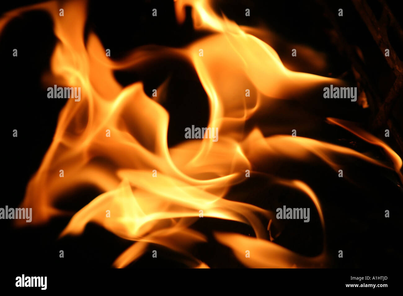 Dancing flames in the night Stock Photo - Alamy