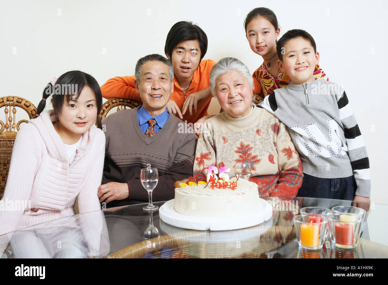 Portrait of a family at a birthday party Stock Photo - Alamy