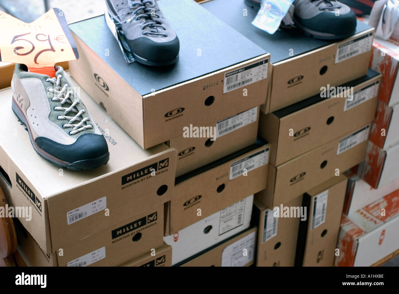 outdoor shop of shoes in france Stock Photo - Alamy