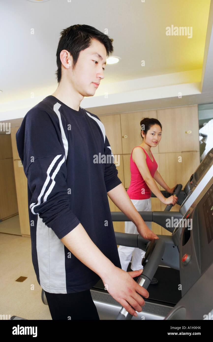 Side view of young woman in a gym hi-res stock photography and images ...