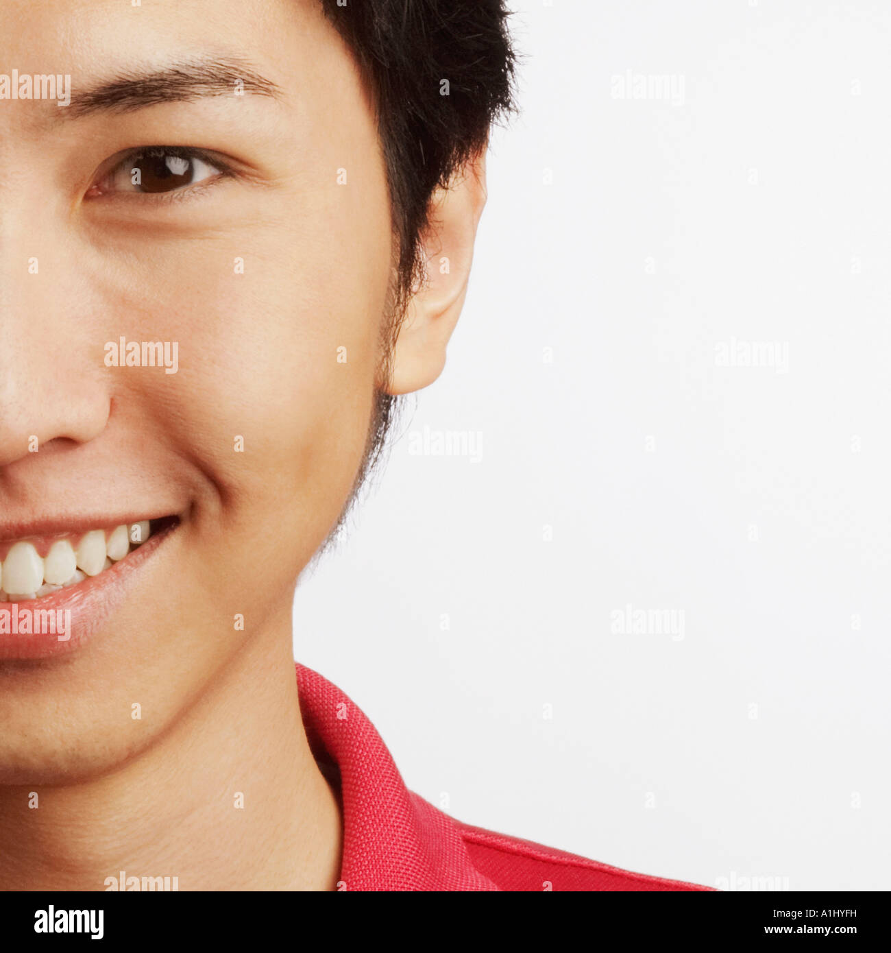 Portrait of a young man smiling Stock Photo - Alamy