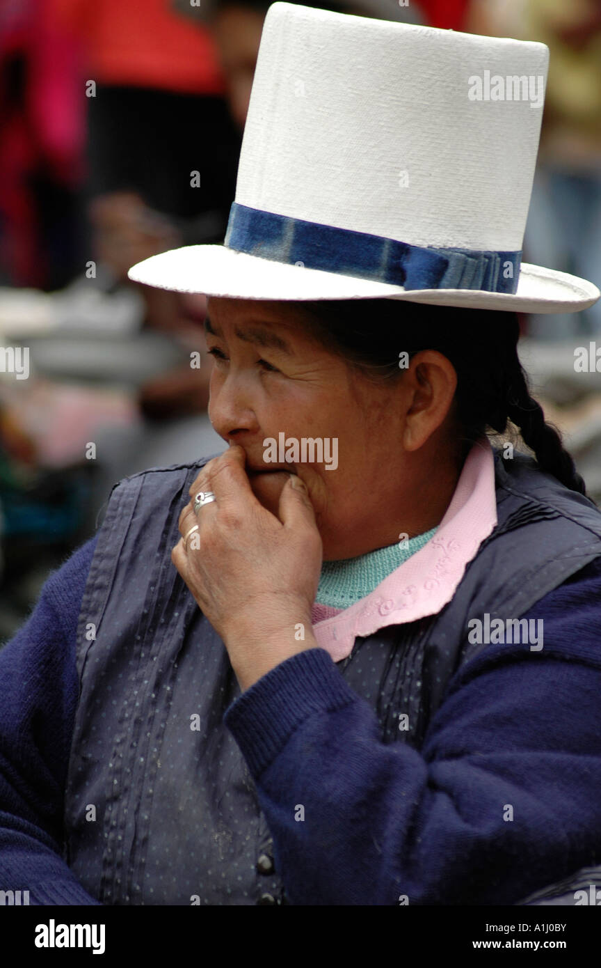 Indigenous woman with hat thinking Peru Stock Photo - Alamy