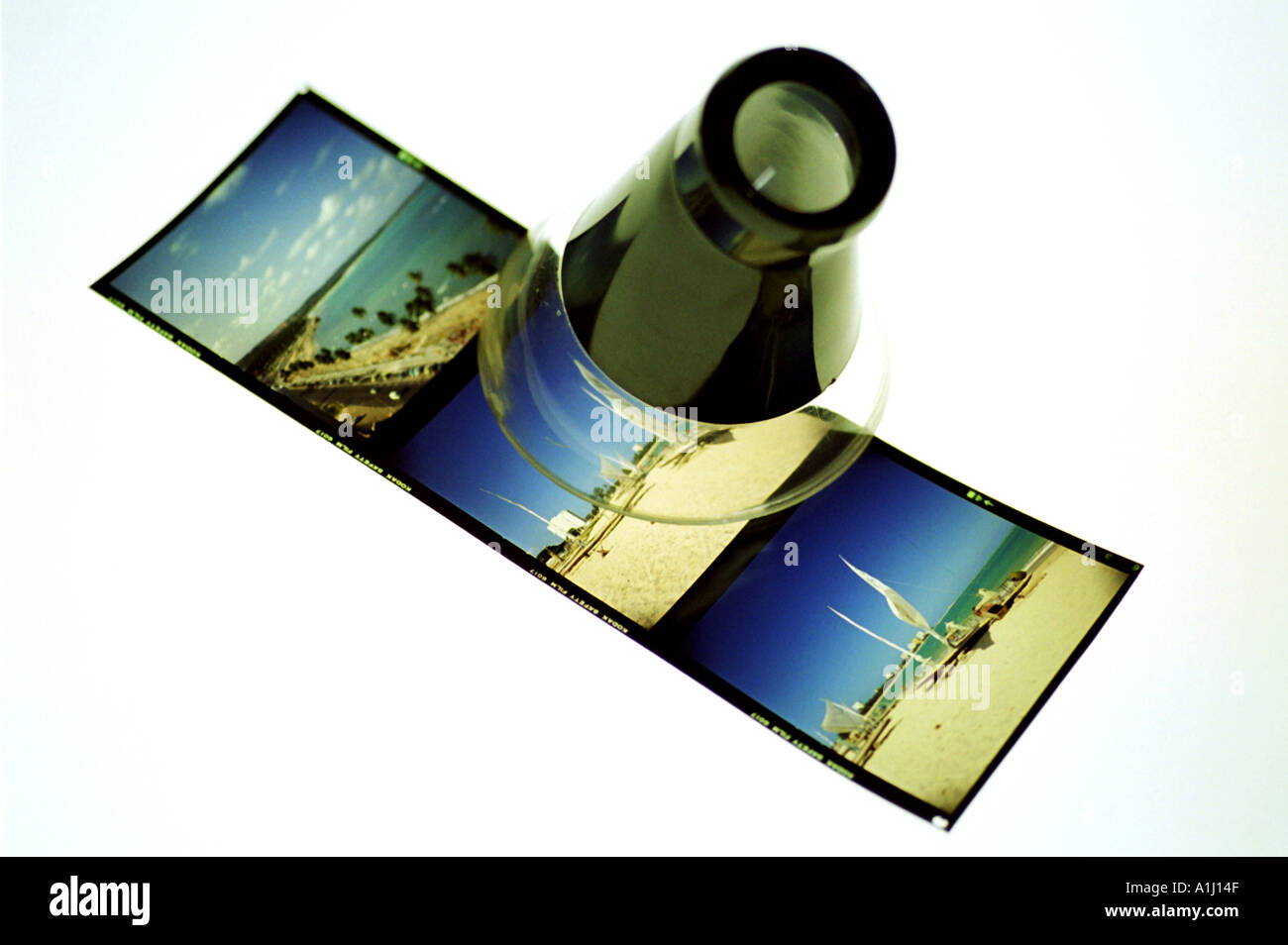 Magnifying lens on film Stock Photo - Alamy