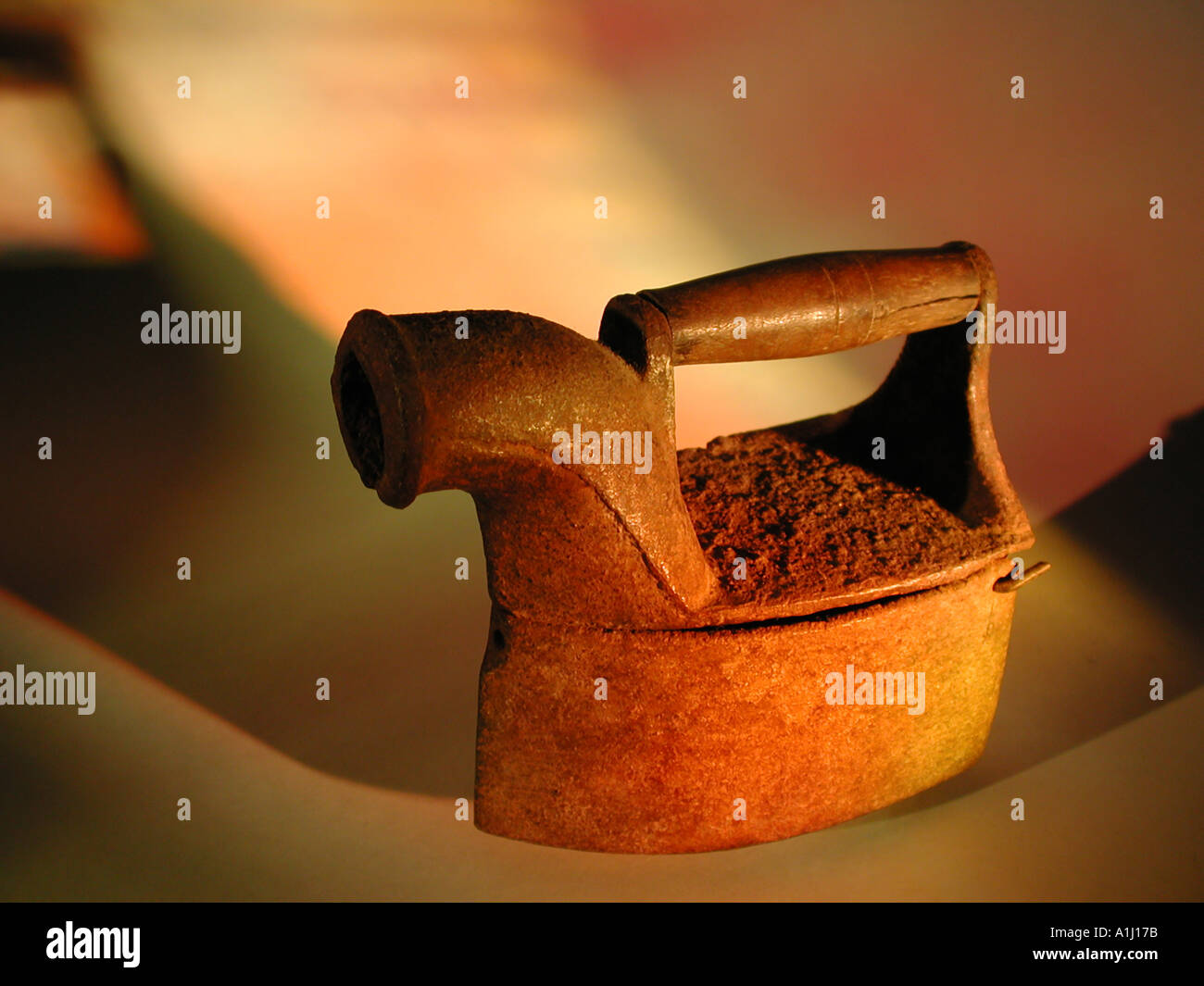 Antique iron made of melted iron Stock Photo - Alamy